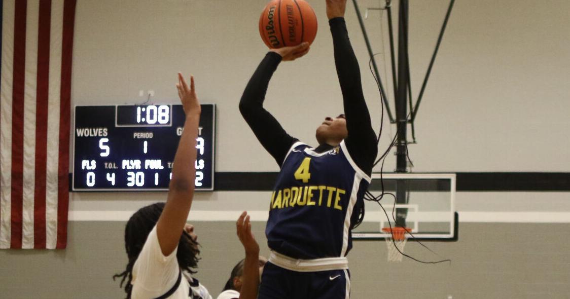 PHOTOS: Marquette Catholic visits Hammond Central in girls basketball
