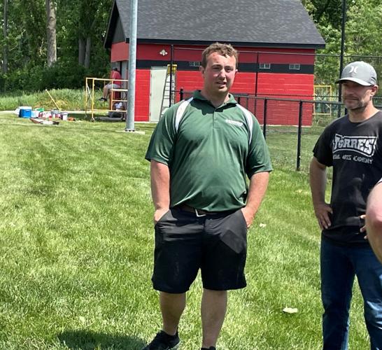 RailCats, union members volunteer to spruce up baseball field