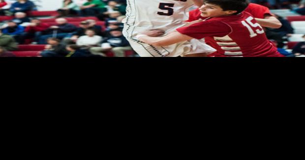 South Central's Max Clemons drives on Crown Point's Sasha Stefanovic