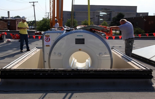 New MRI machine lowered through roof into Franciscan St. Margaret ...