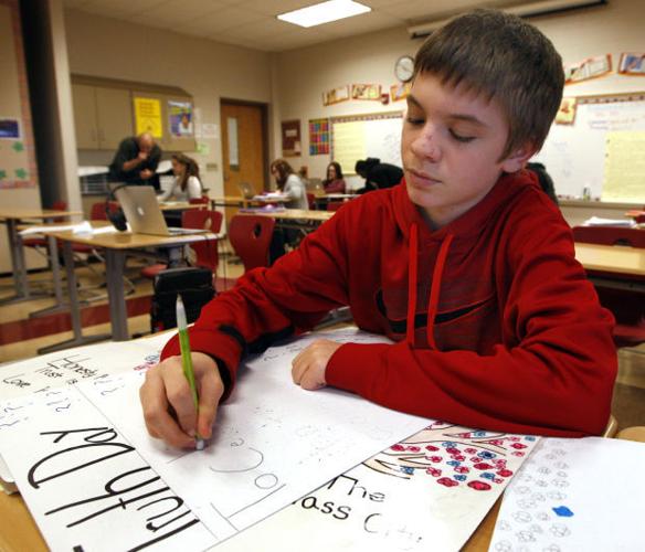 Lowell Middle School school eighth-graders create Utopian society