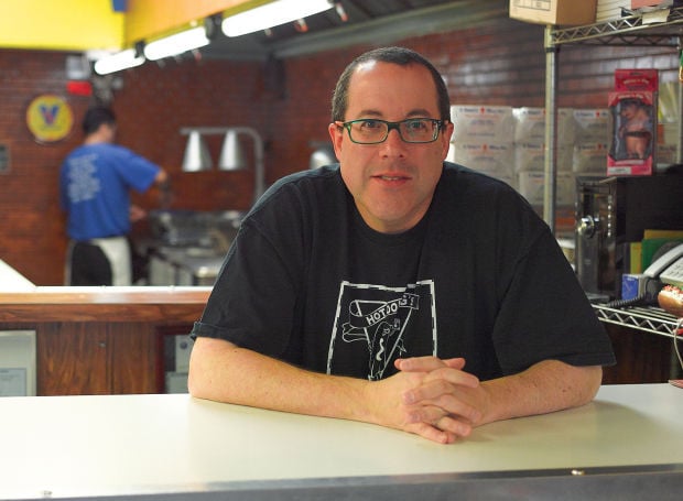 Doug Sohn celebrates the hot dog