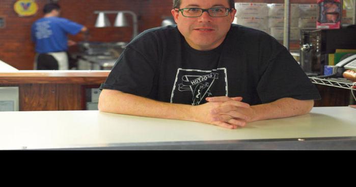 Doug Sohn celebrates the hot dog