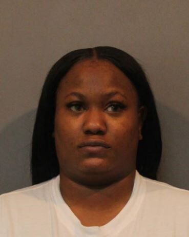 Woman charged with sending mail laced with suspected PCP to jail inmate