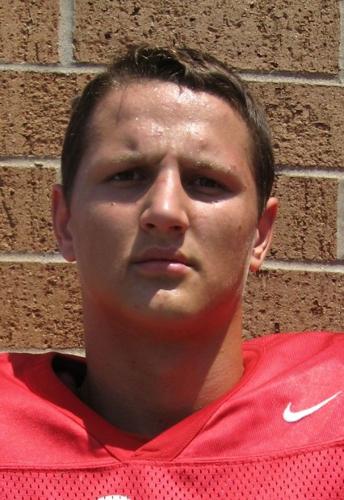 At 6-6, Morgan Kral doesn't fit in big brother Tyler's shade