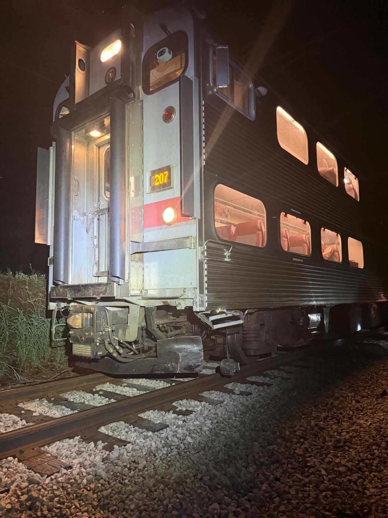 South Shore train hits vehicle stuck on tracks, police say