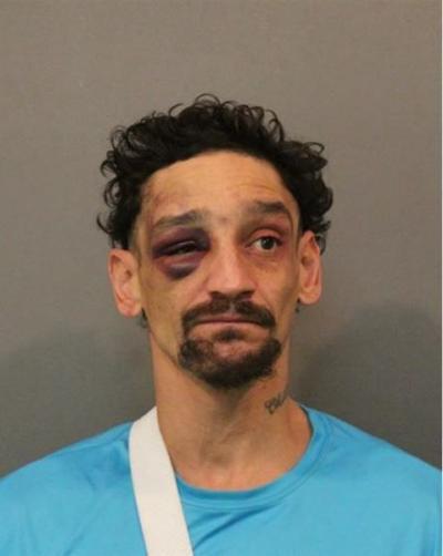 Man grabbed for officer's gun during arrest on domestic battery charges ...