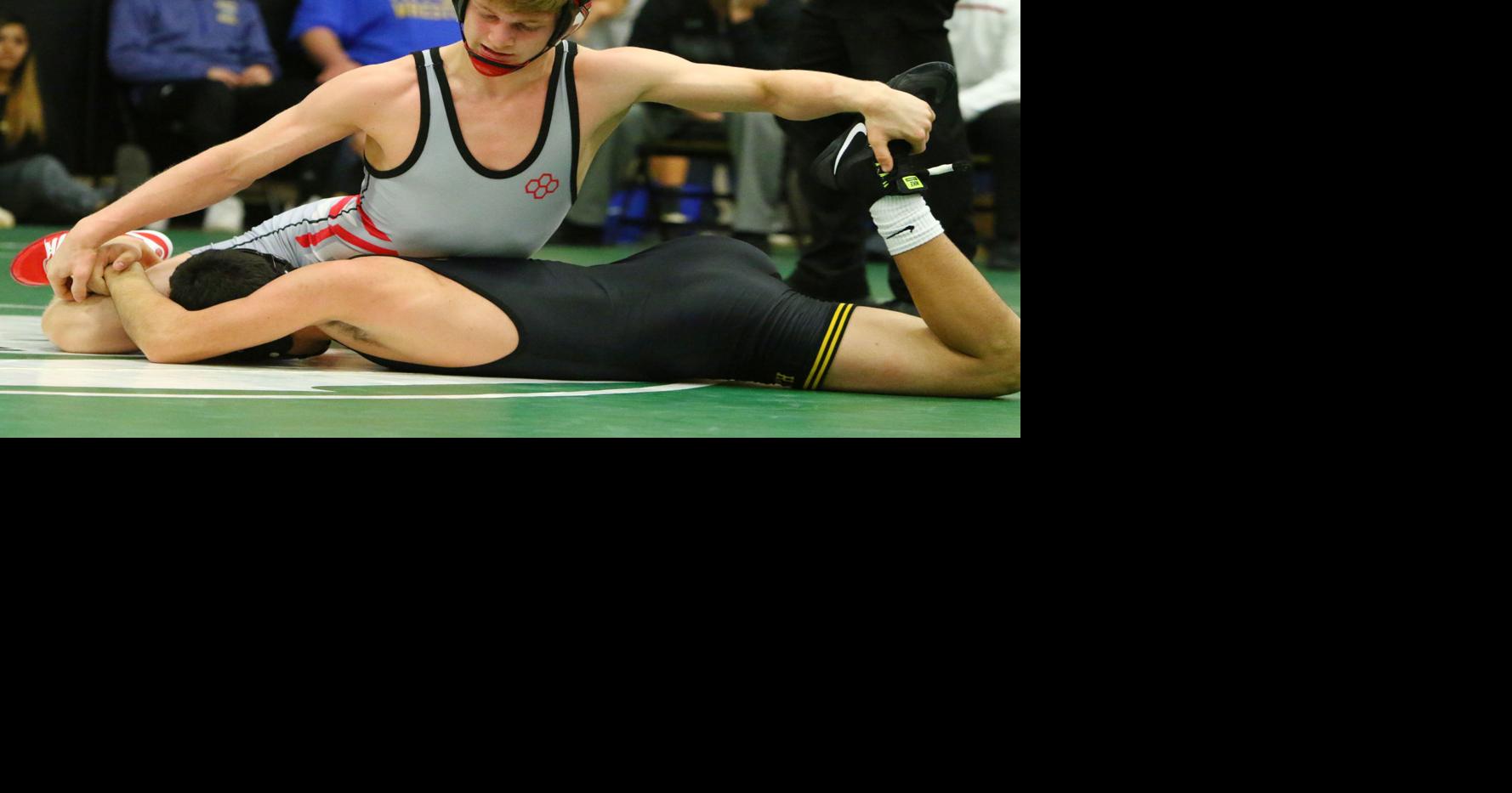 Portage wins 11 weights as it rolls to Griffith wrestling sectional title