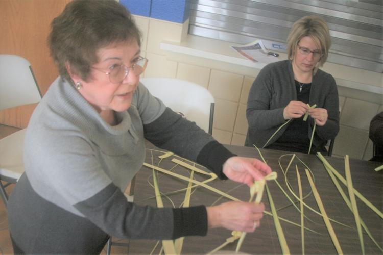 Braiding palms a "labor of love for God"