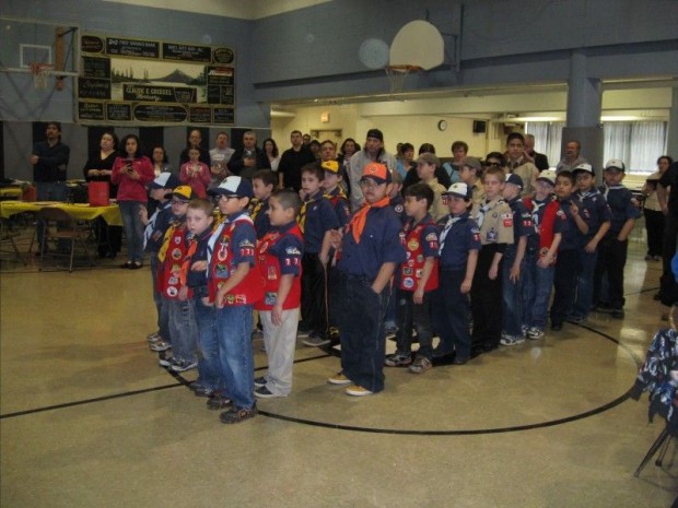 Webelos from East Side cross over to Boy Scouts