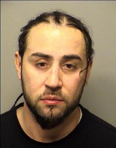 Stranger leans into vehicle to find gun staring him down