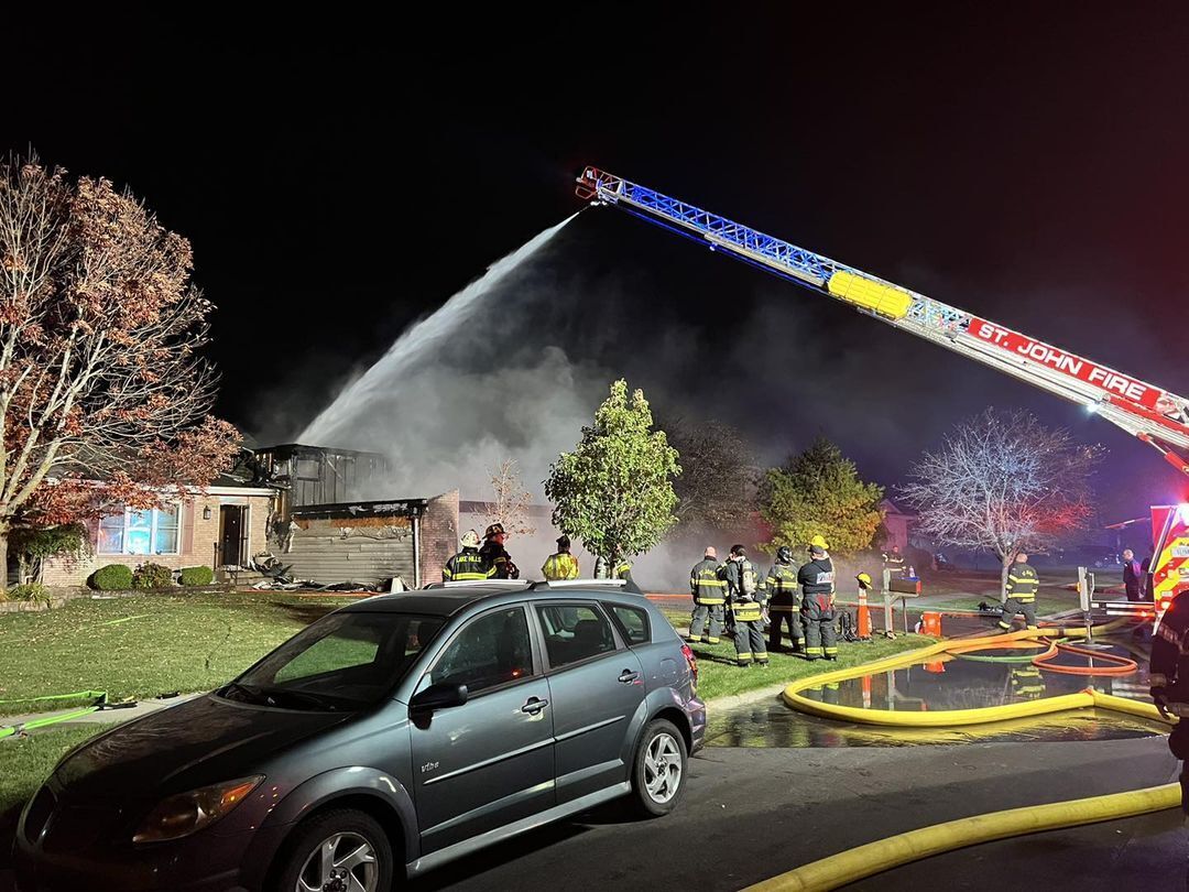 Several Region fire departments battle house fire