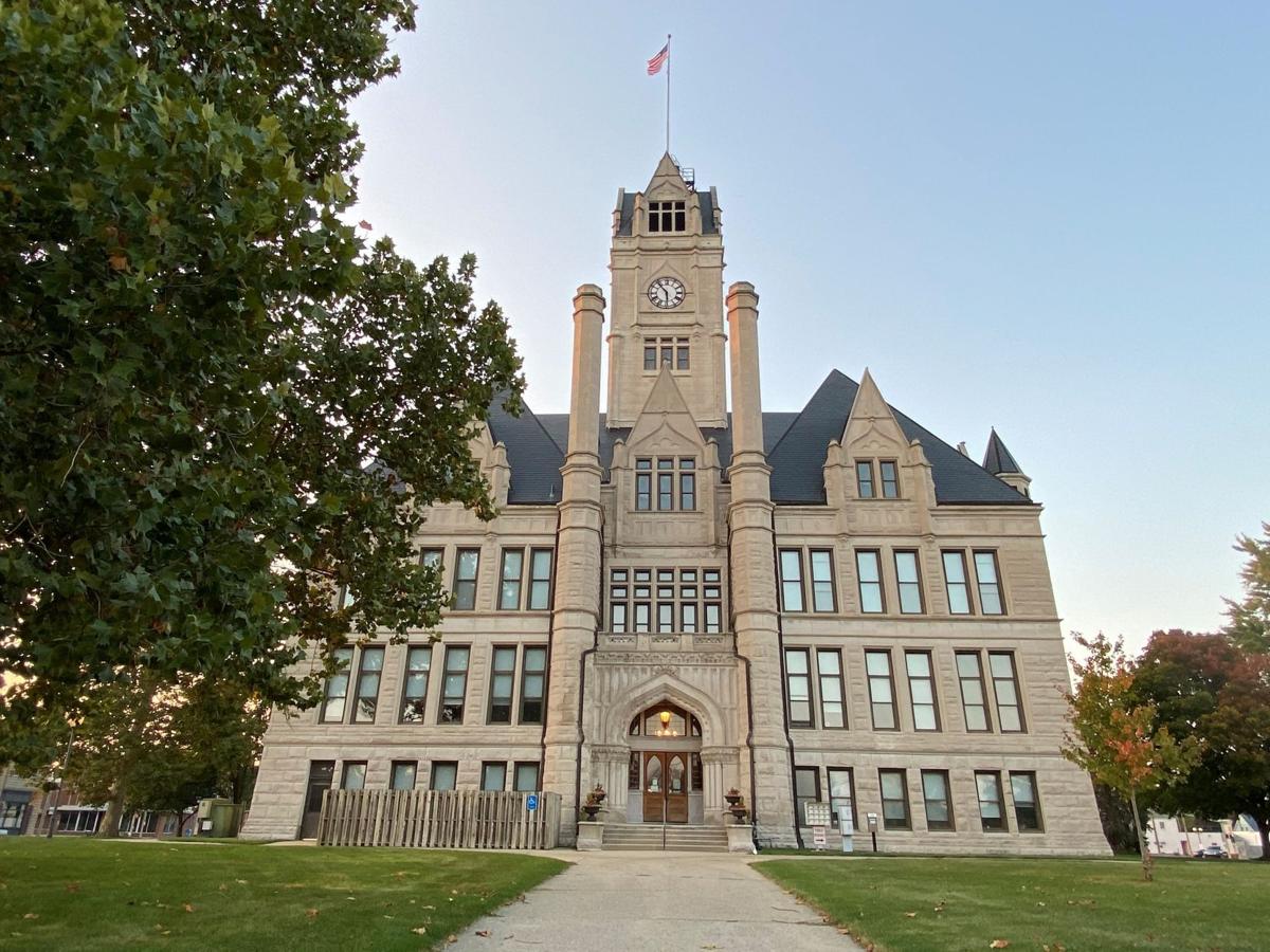 Region officer nabbed smuggling drugs, phone into county jail, police say