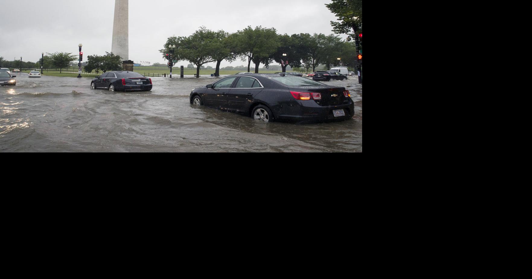 Photos: Heavy rains strand Washington drivers, flood White House basement
