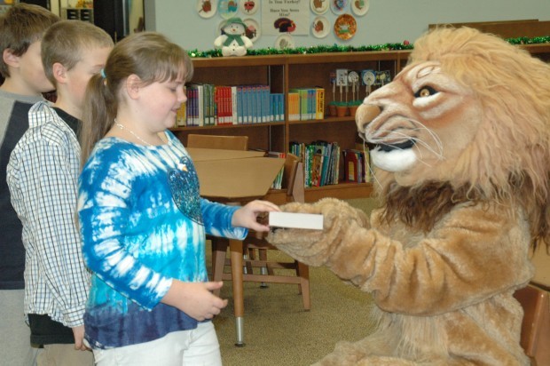 Third graders receive dictionaries