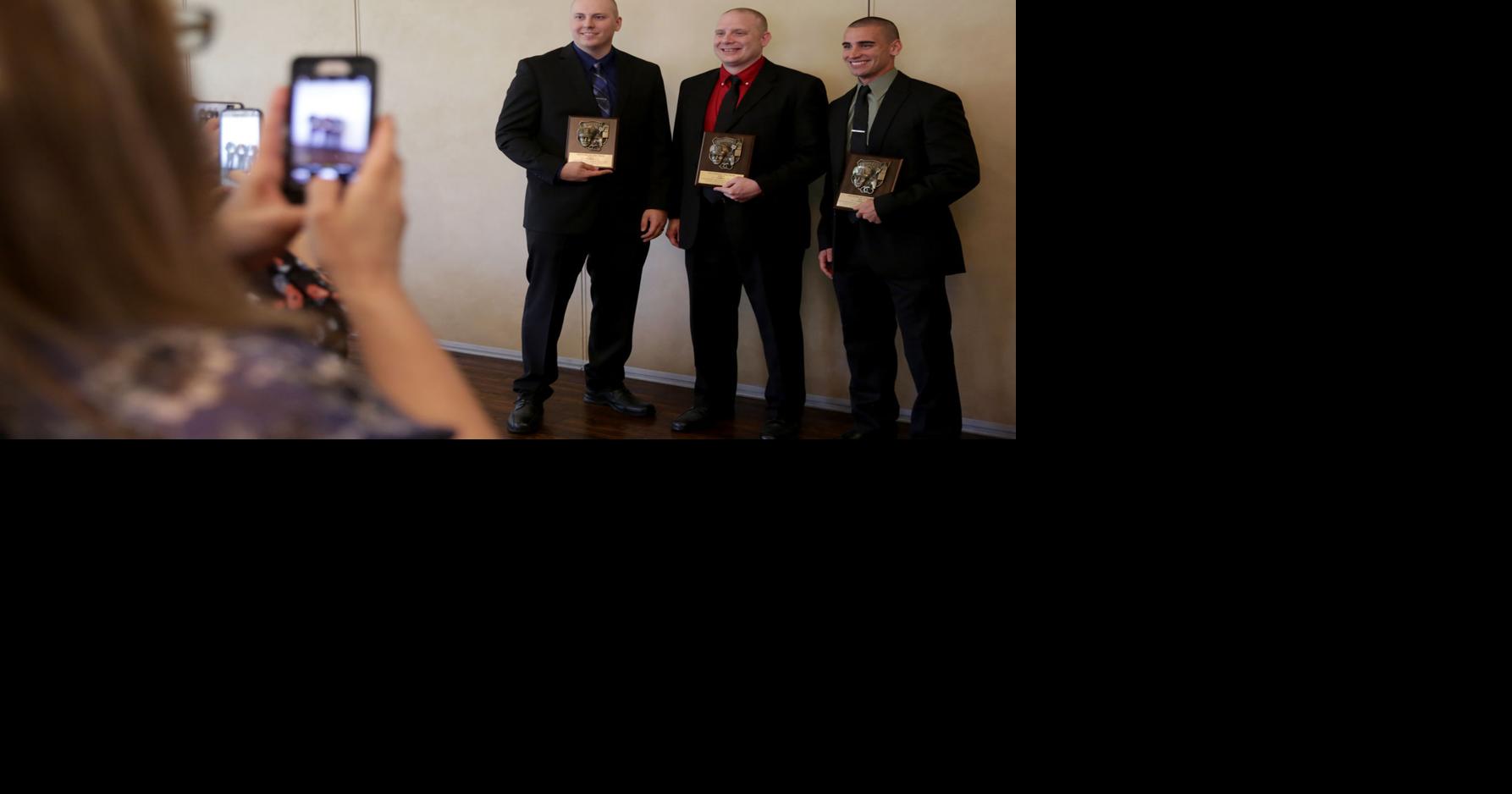 Police officers recognized for heroics, dedication