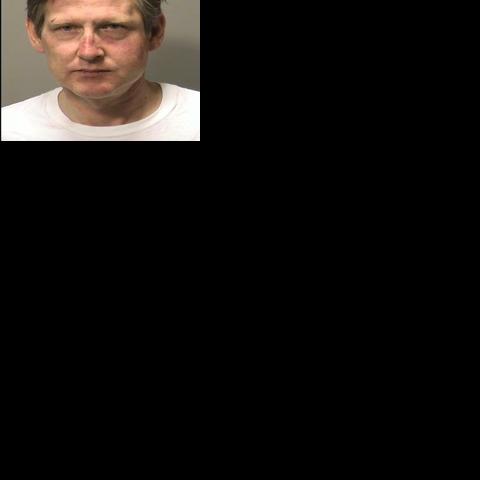 Man arrested after menacing bar patron with gun