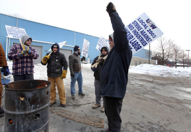 Steel center workers striking in Portage