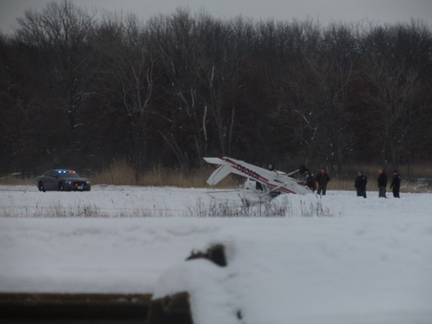 Plane flips on landing at Griffith-Merrillville Airport