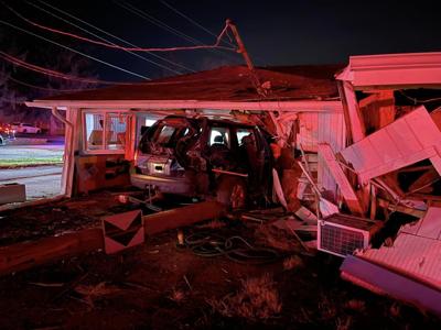 Vehicle crashes into Crown Point office building, officials say