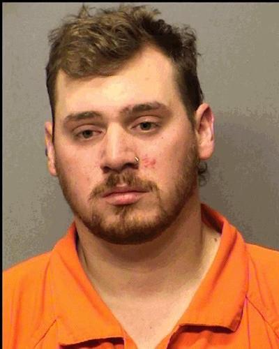 Drunken motorist crashes into Portage house and flees on foot, police say