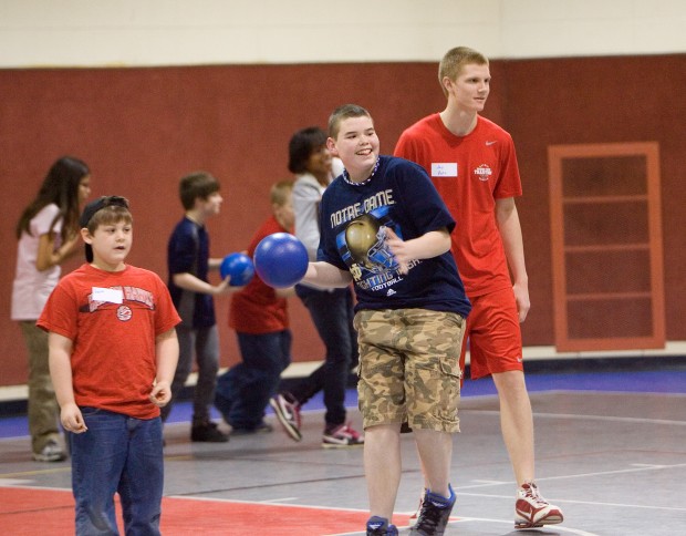 Hebron High cagers bring game to Boys and Girls Club