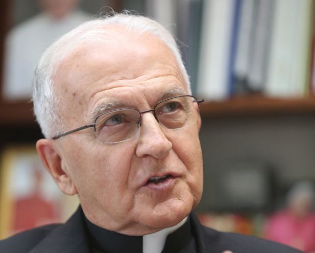 Melczek applauds Cardinal George, new archbishop