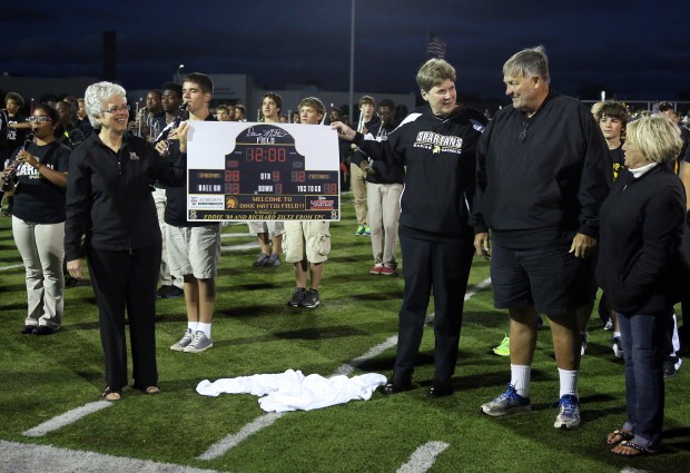 Marian Catholic names stadium for athletic director