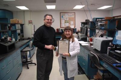 Indiana State Police forensic scientist recognized for 30 years of service