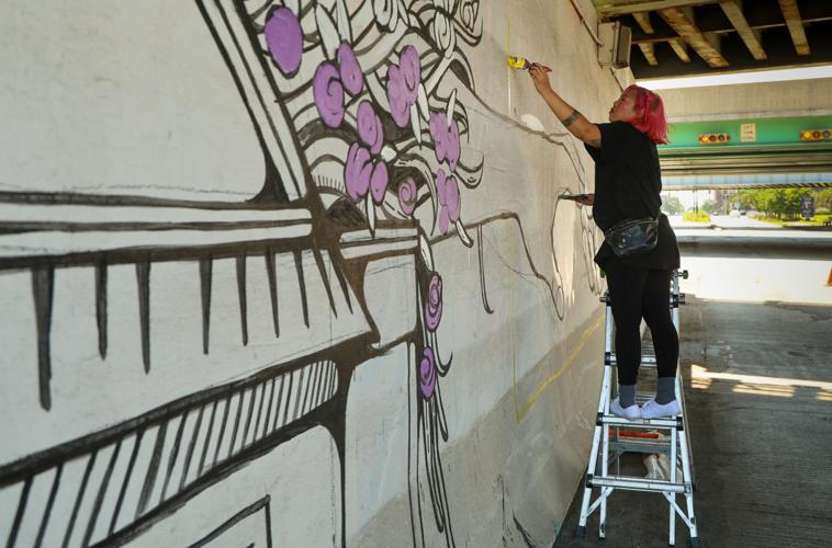 International artist brightens downtown Gary with mural