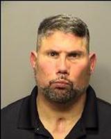 Prison guard locked up, falsely claimed threat with own gun