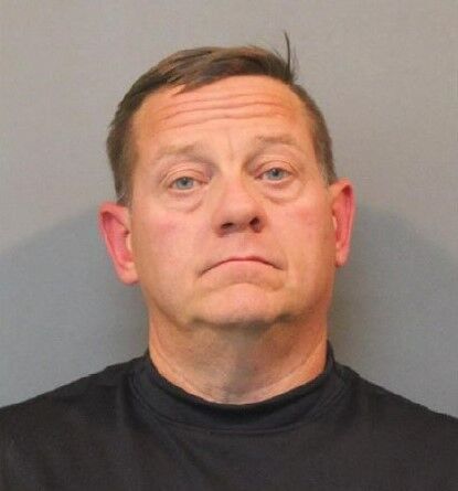 Former St. John official charged with impersonating cop
