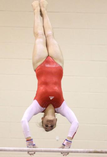 Portage's Madison Kurtz competes on bars at Chesterton's Sectional.