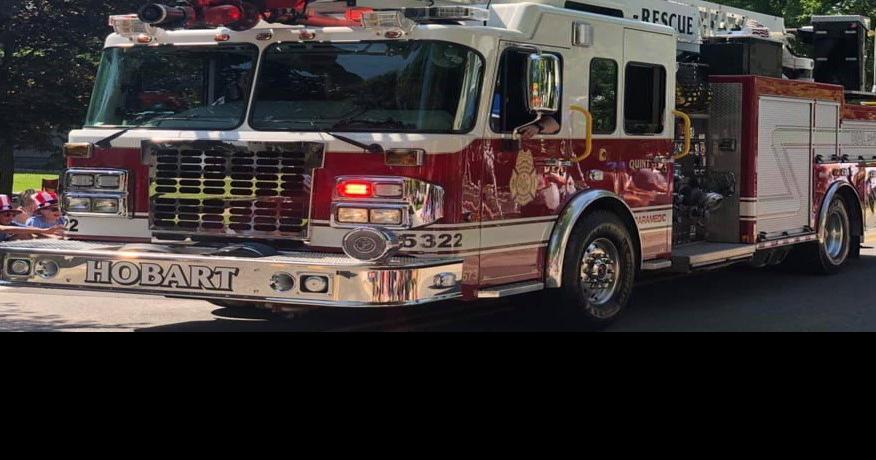 Garage fire spreads to 2 houses, officials say