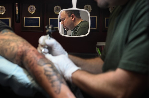 Hammond 'upscale' tattoo shop owner has designs on expanding to Hobart