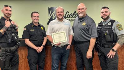 Winfield honors police chaplain for help in tragedy