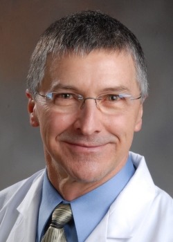 Dr. Kenneth R. Hyde receives Maynard K. Hine Medallion