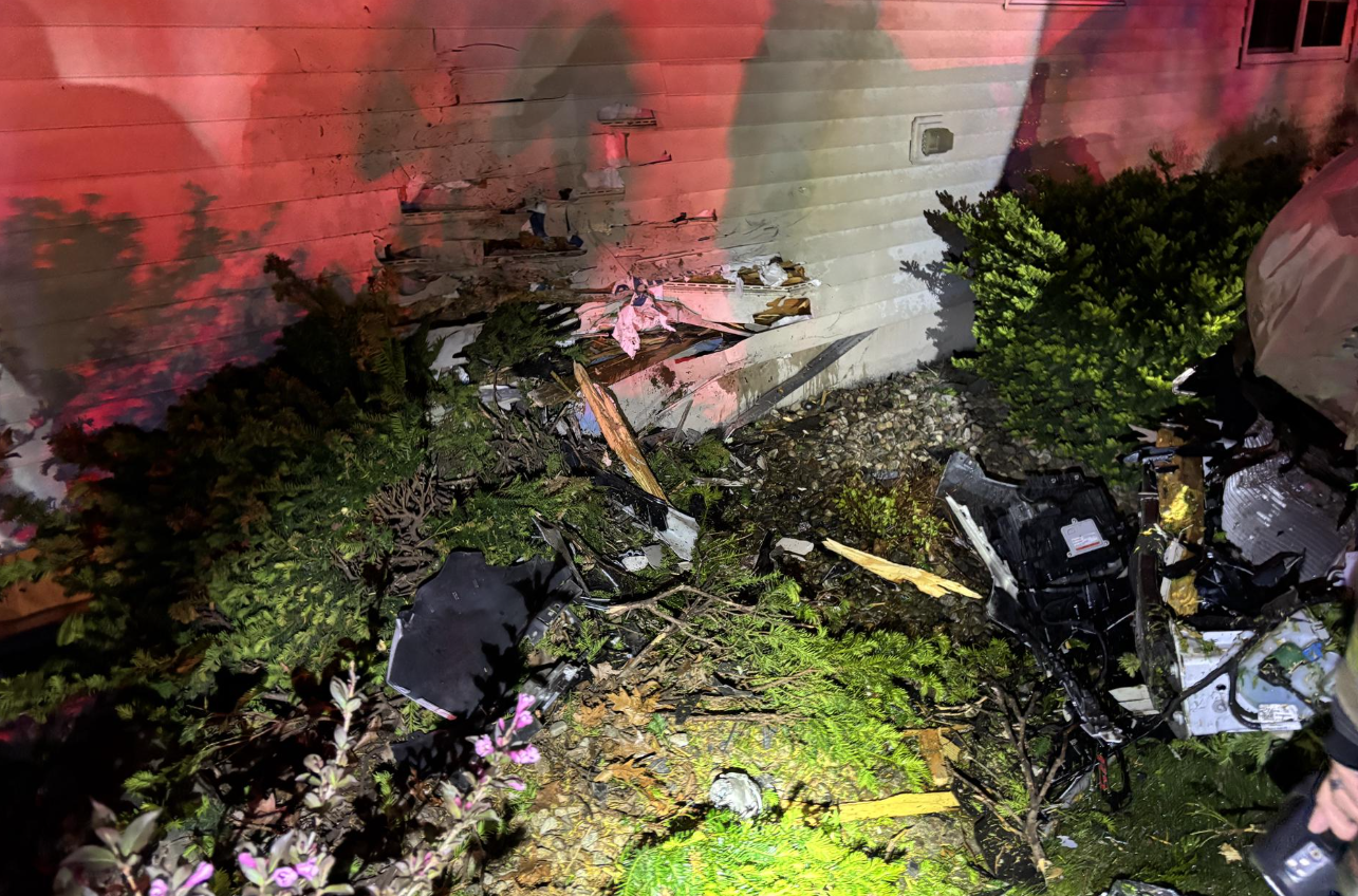Driver fleeing at 130 mph crashes into Portage home, cops say