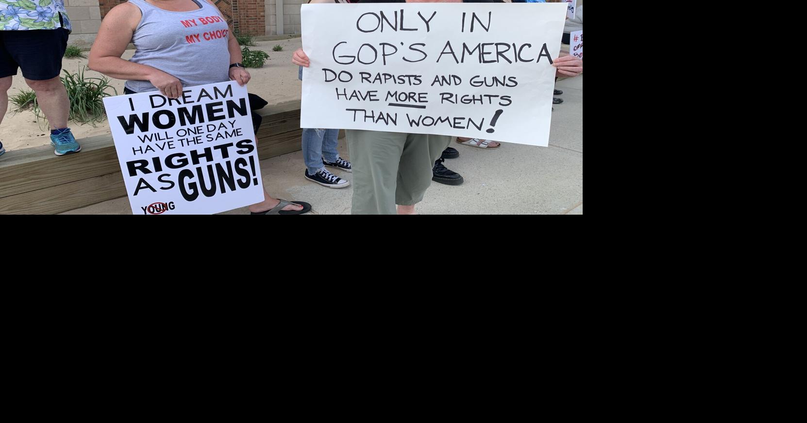 Pro-choice protesters picket at Todd Young's event in Chesterton