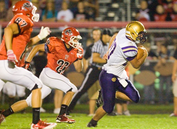 Kougars withstand late rally to get NCC win over Brickies