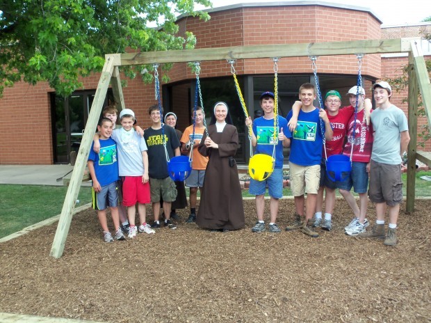 Munster Scouts bulid swing set for Carmelite Home