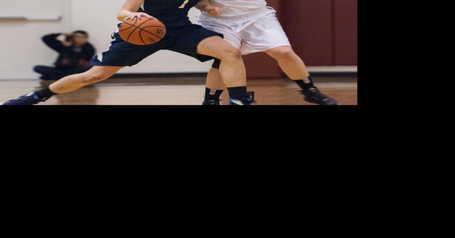 Marquette Catholic grabs lead in GSSC girls hoops fight