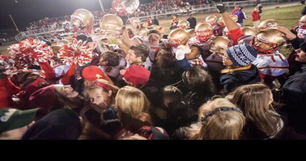 Andrean's football team celebrates with its fans after defeating Fort ...