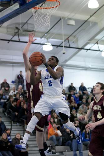 Lake Central senior Tye Wilburn takes a shot during Friday night's ...