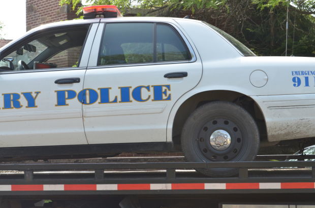 Gary officer killed; three people in custody