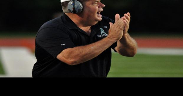 Whiting coach Jeff Cain cheers his team on against Boone Grove
