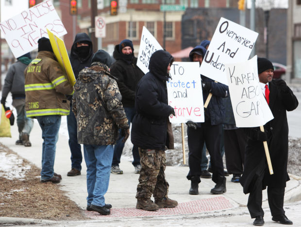 Gary police, fire picket outside Genesis Center