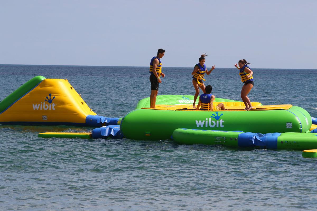 Floating WhoaZone water park to reopen on Lake Michigan | Jobs and ...