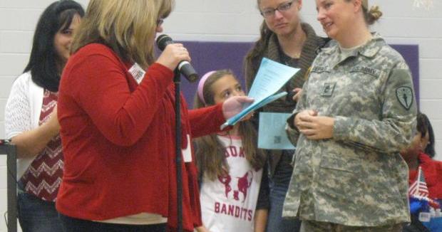 Iddings Elementary School makes Veterans Day a banner event