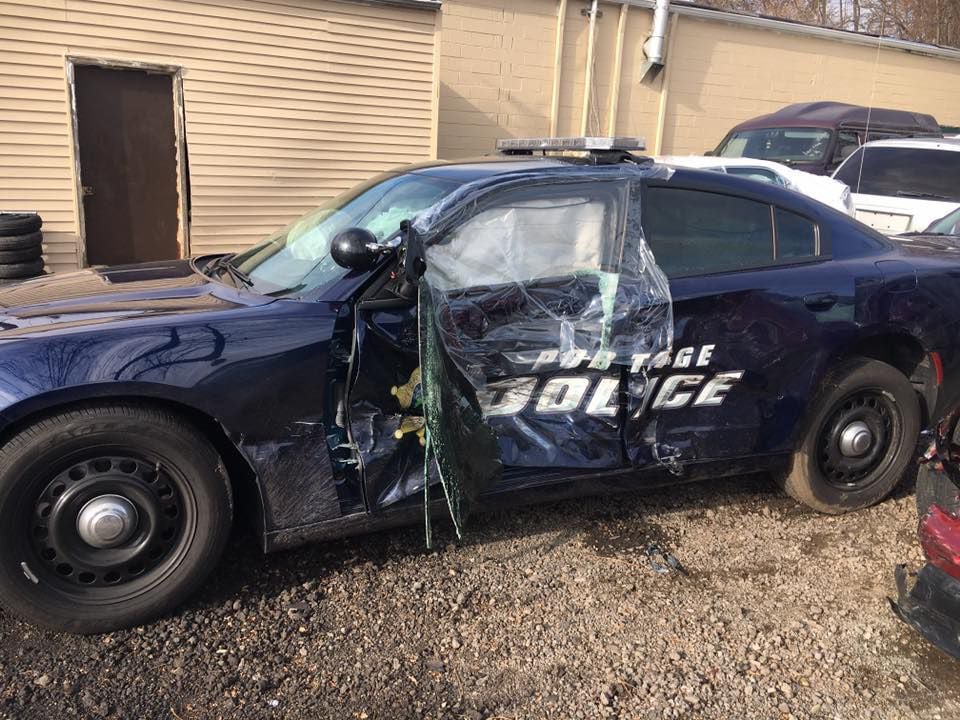 Police: Driver ran red light, injured Portage officer